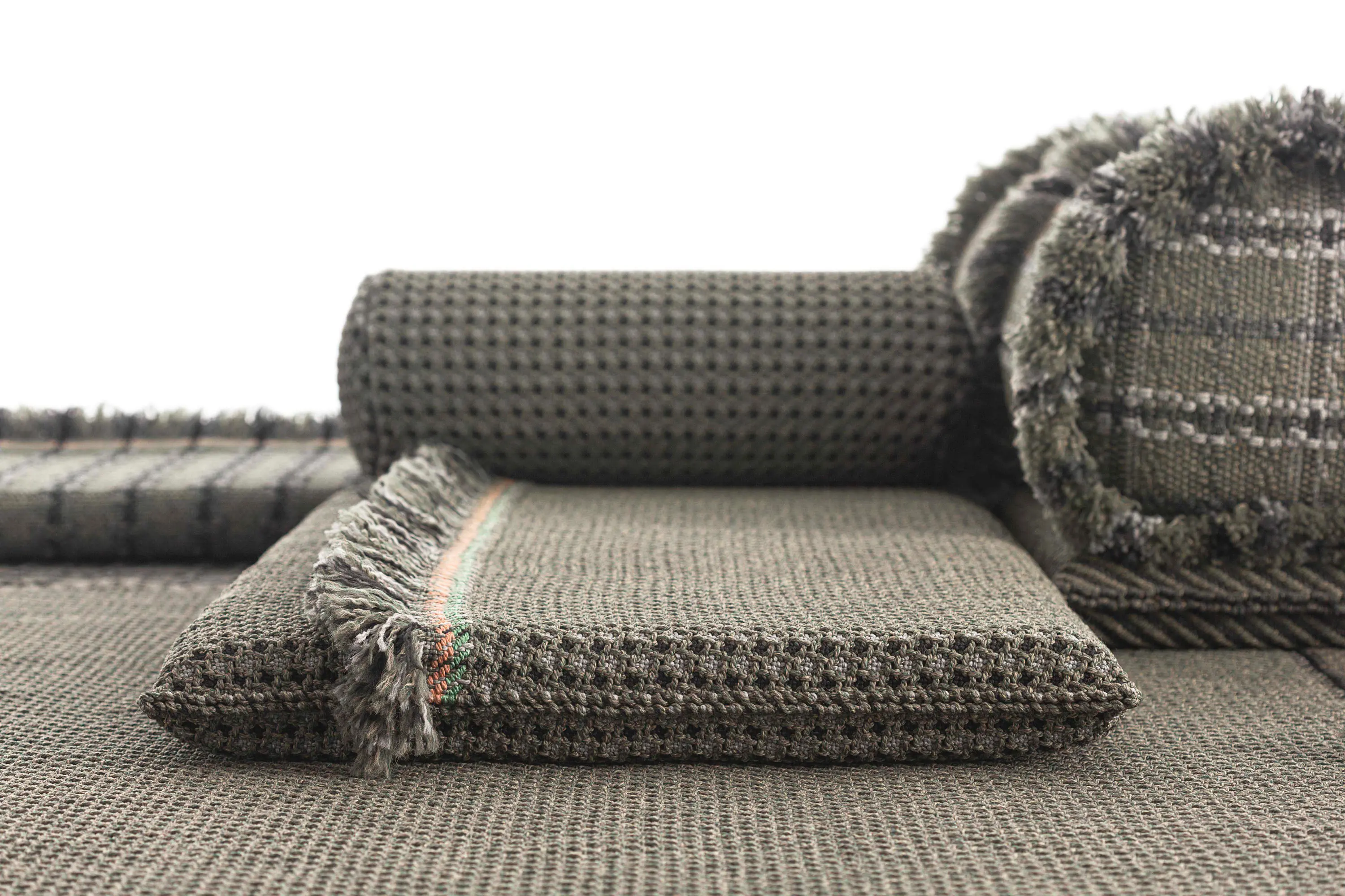 GARDEN LAYERS BIG ROLL TARTAN BLUE - Cushions from GAN | Architonic